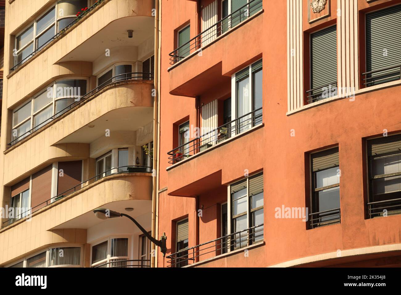 Colorful facade with windows and balconies of residential apartments ...