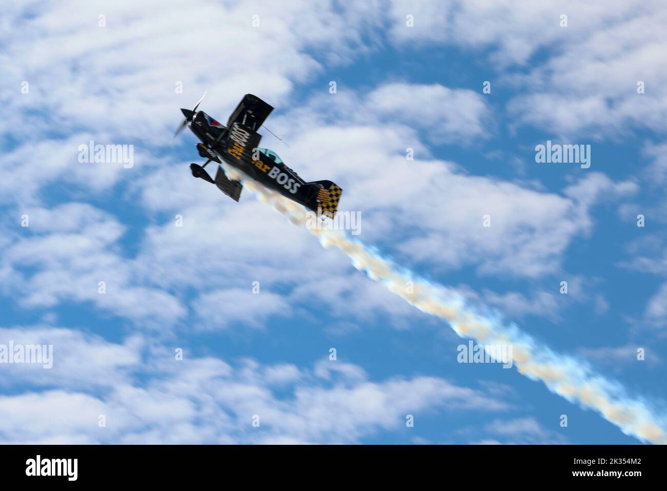 Jon Melby, piloting his Pitts S-1B Muscle Bi-Plane, performs aerobatics ...