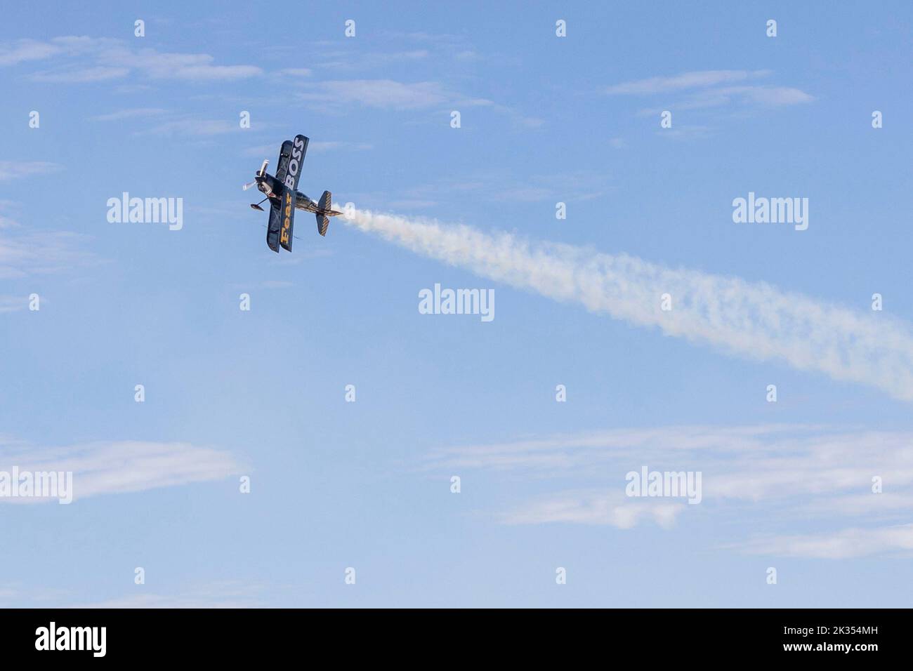 Jon Melby, piloting his Pitts S-1B Muscle Bi-Plane, performs aerobatics ...