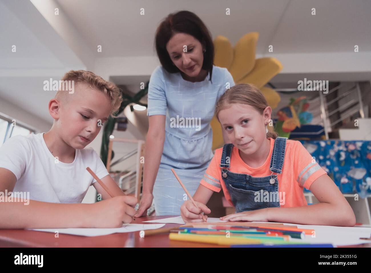 Creative kids during an art class in a daycare center or elementary ...