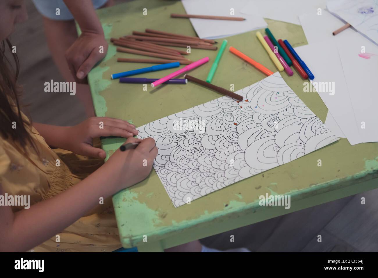 Creative kids sitting in a preschool institution, draw and have fun ...