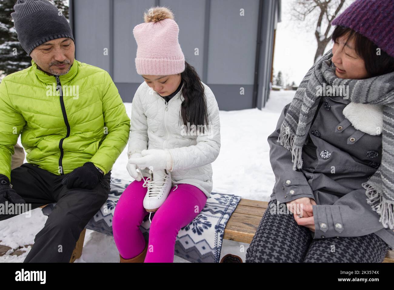 Parents watching daughter skate hi-res stock photography and images - Alamy