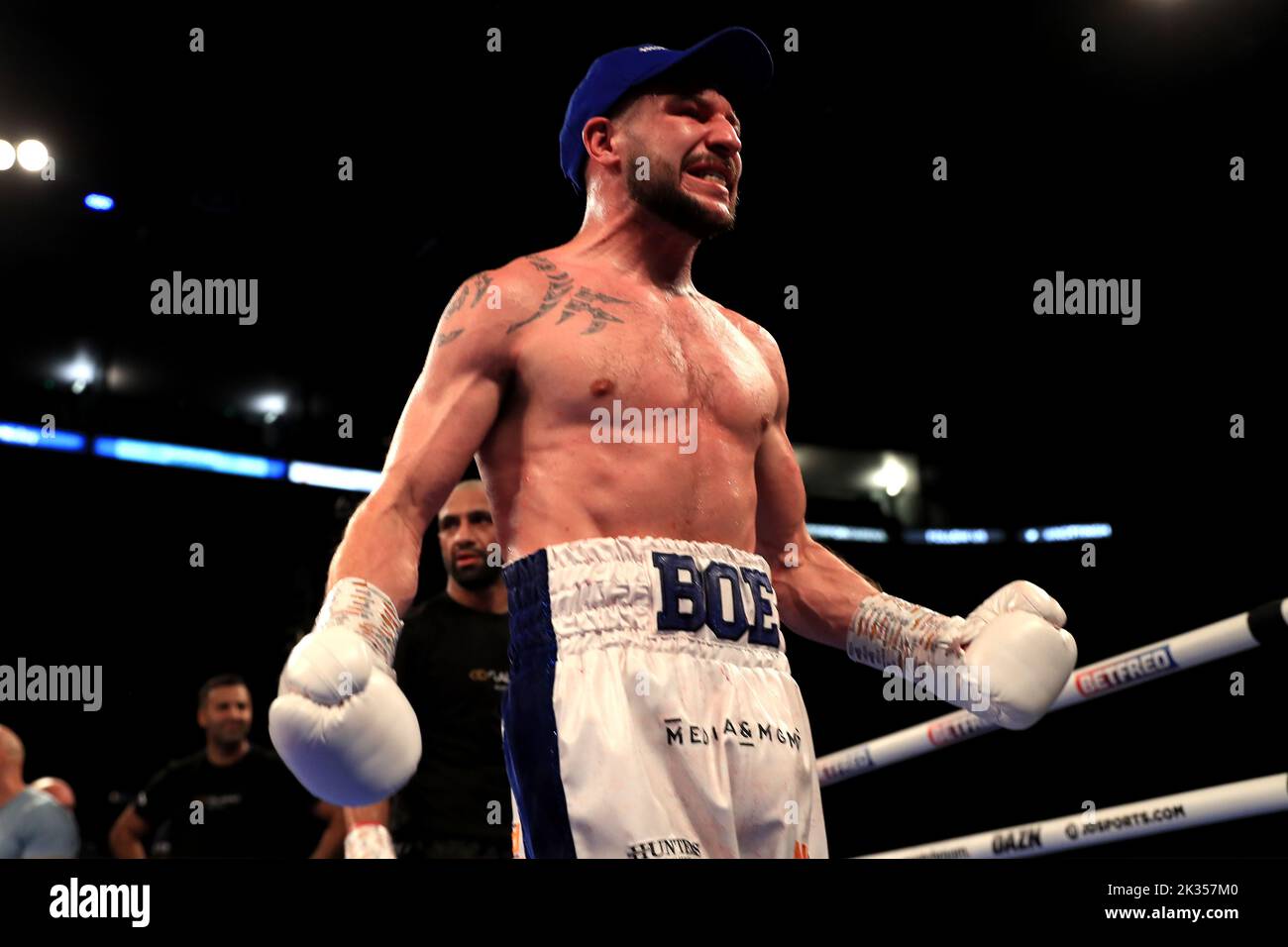 Maxi Hughes celebrates winning the IBO World Lightweight title fight ...