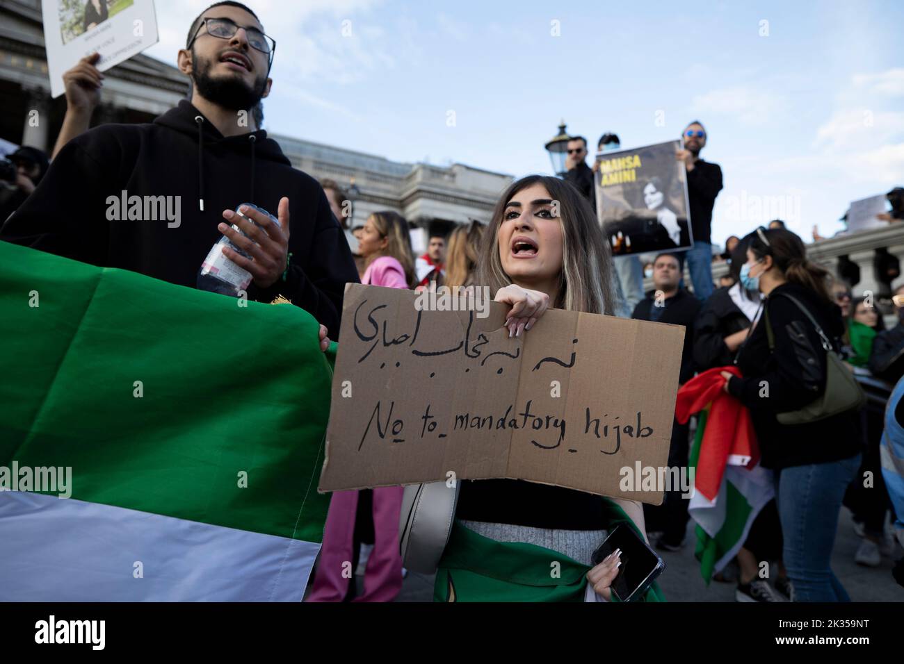 London, UK. 24th Sep, 2022. A female protester seen holding a placard ...