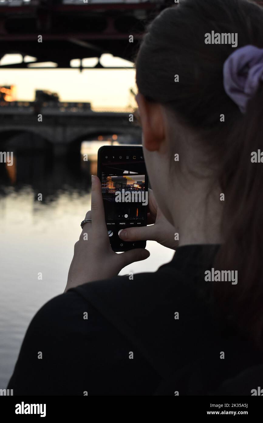 Girl Taking Photos of Bridges Across the River Clyde in Glasgow ...