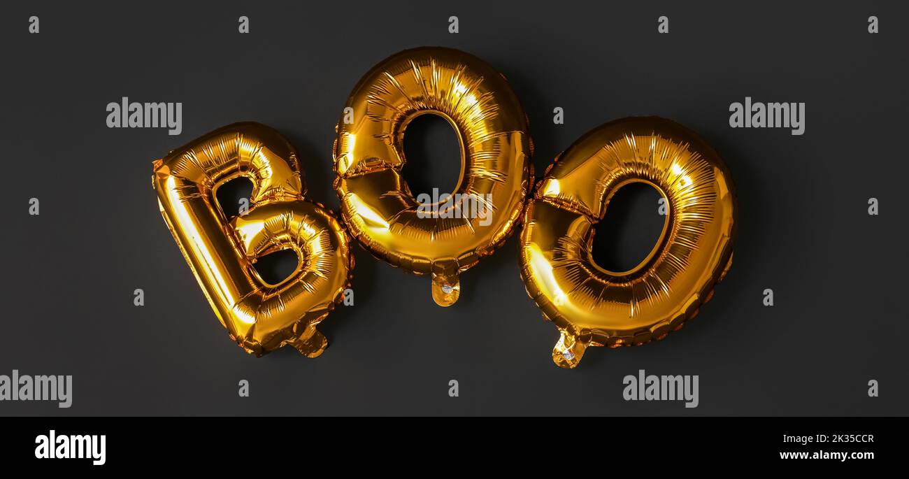 Word BOO made of golden balloons on dark background. Halloween ...