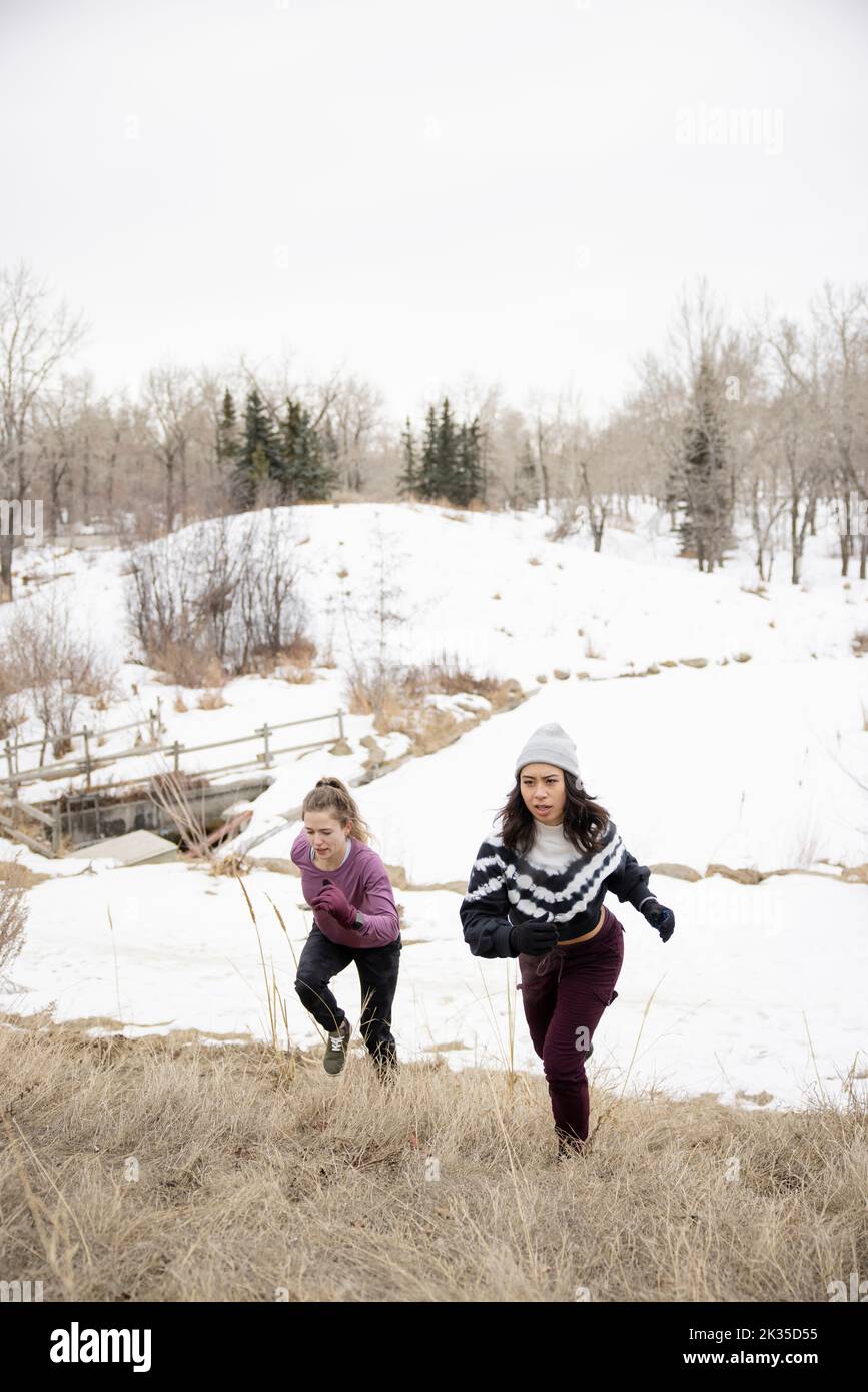 Running up slope hi-res stock photography and images - Alamy