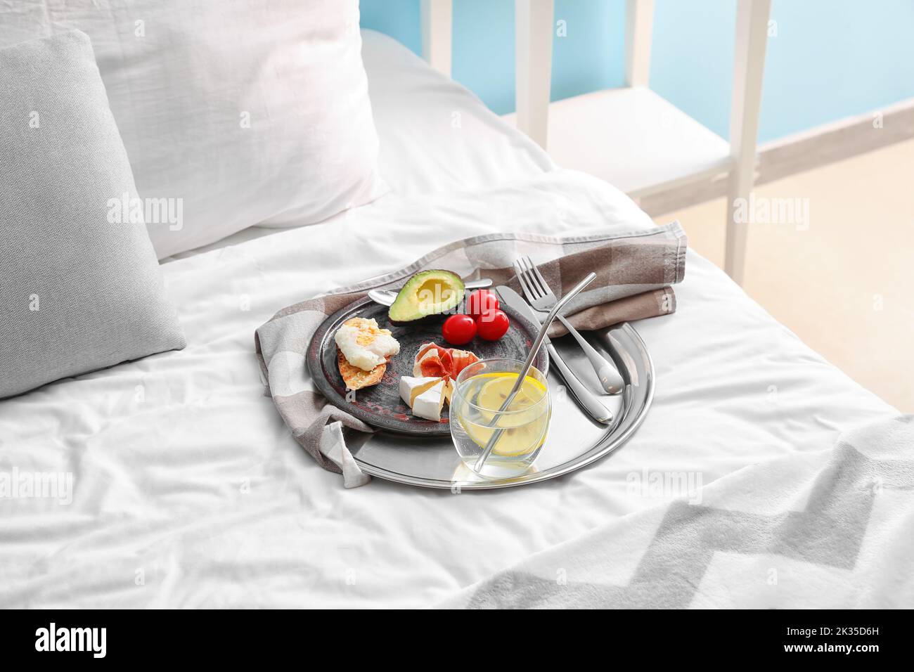 Tray with delicious breakfast in bedroom Stock Photo - Alamy