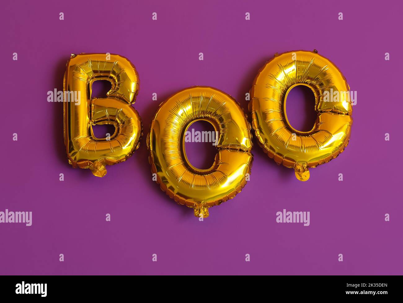 Word BOO made of balloons on purple background. Halloween celebration ...