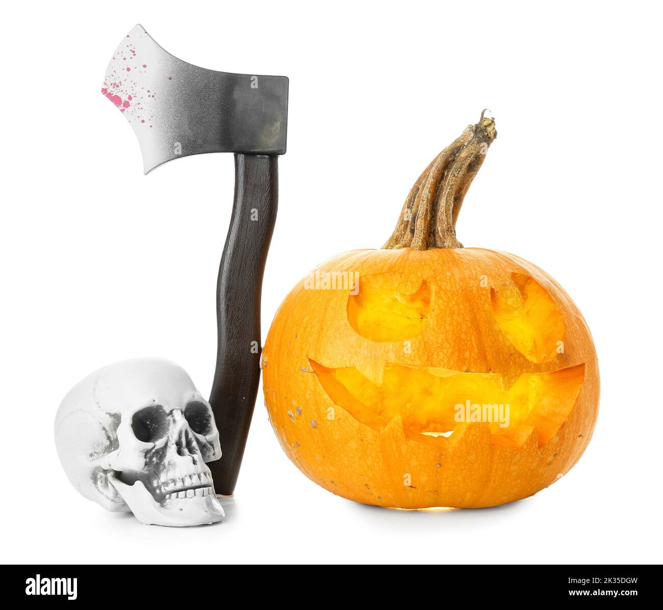 Carved Halloween pumpkin with human skull and axe on white background ...