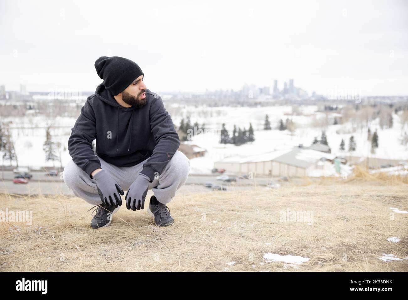 Adult squatting hi-res stock photography and images - Alamy