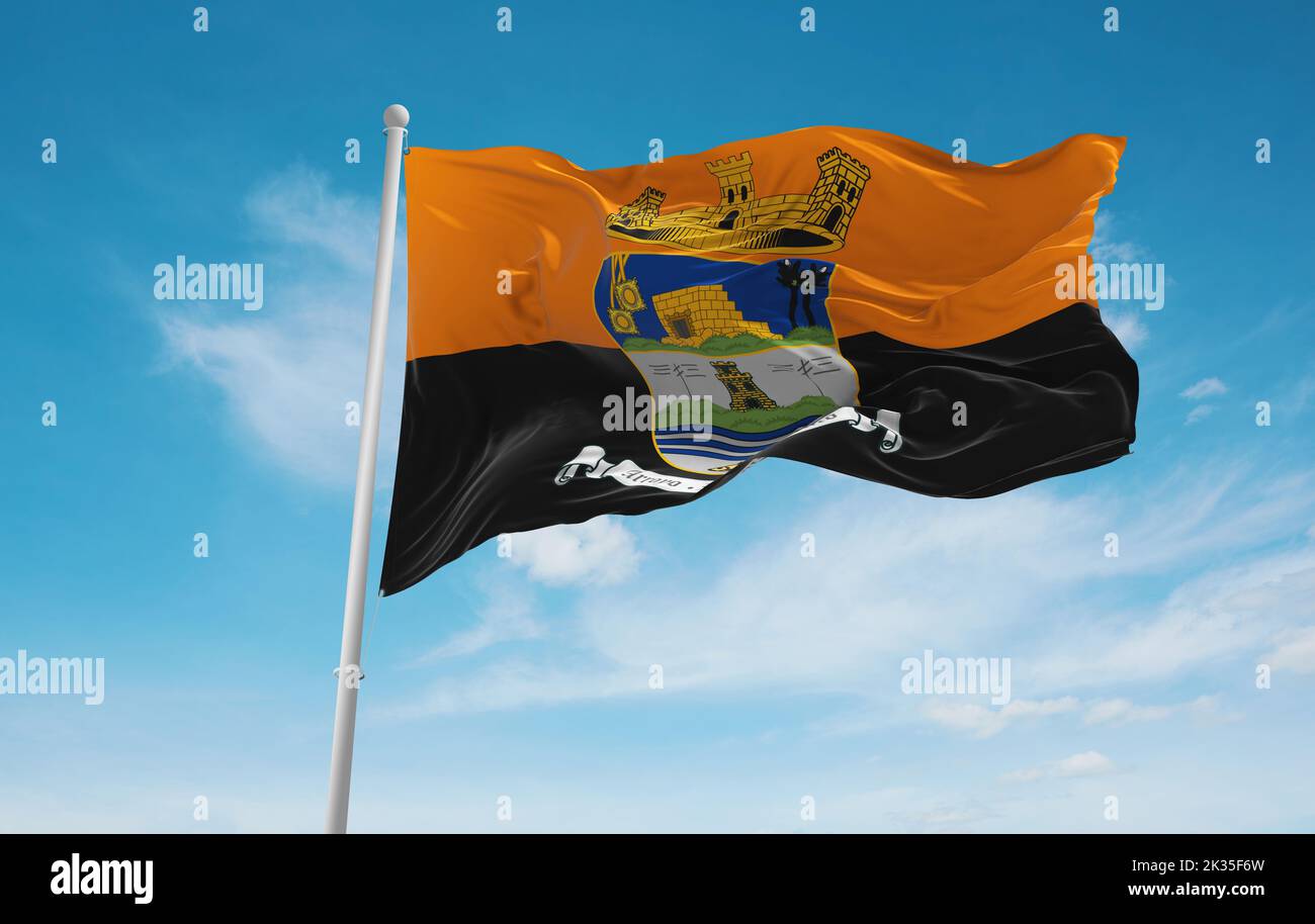 official flag of Arroyo untied states of America at cloudy sky ...