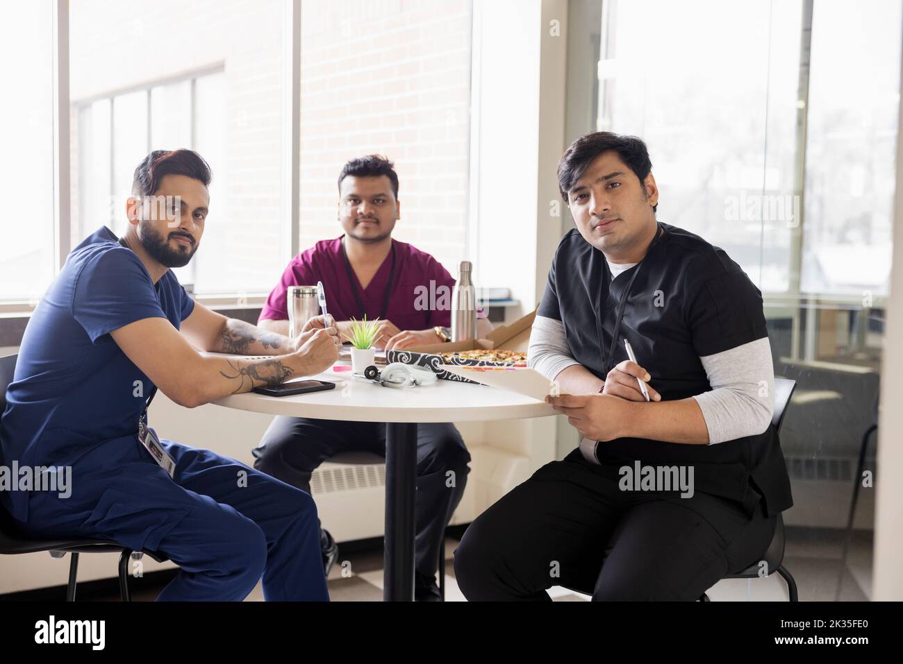 Black man eating lunch in hi-res stock photography and images - Alamy
