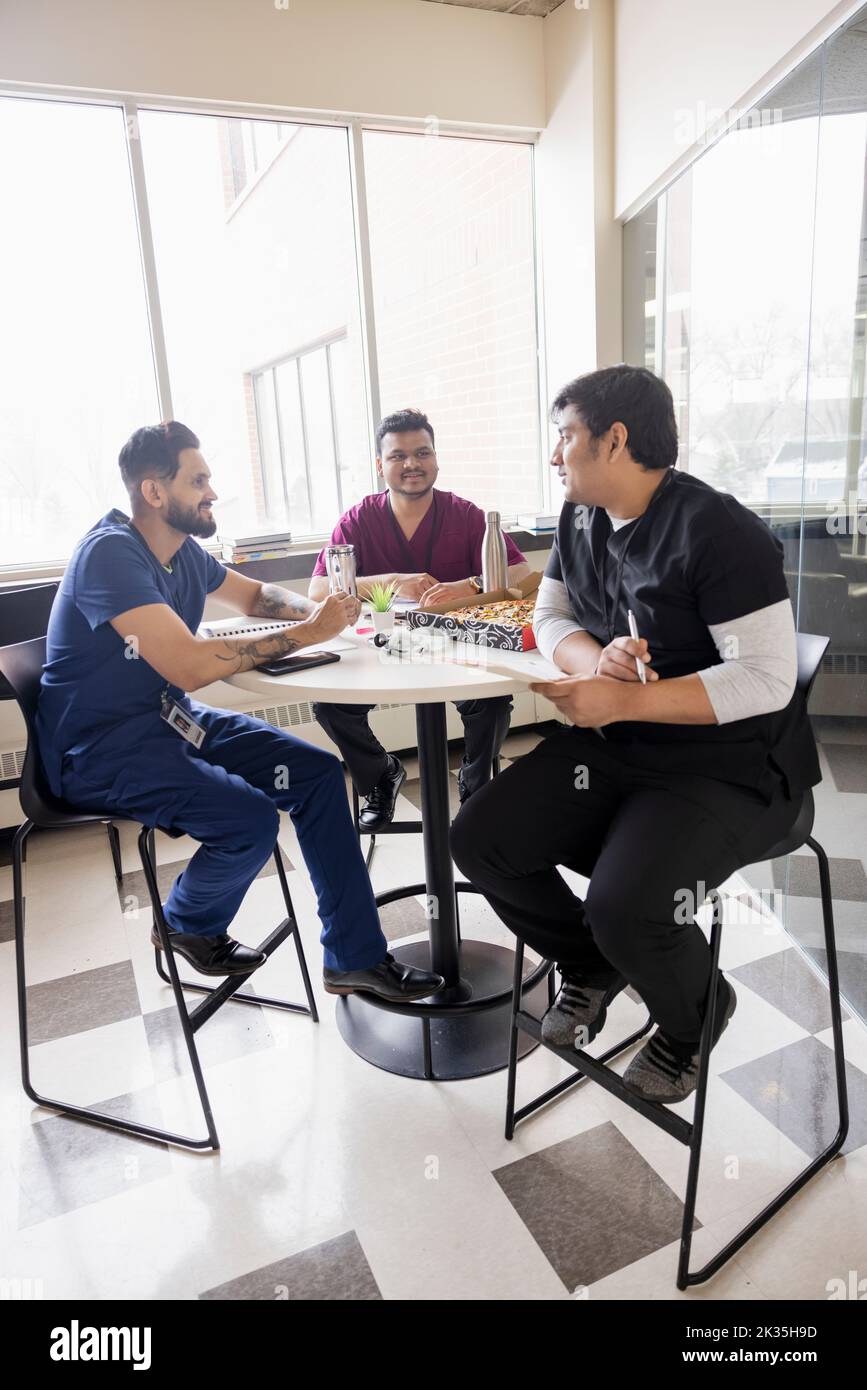Doctor eating break hi-res stock photography and images - Alamy