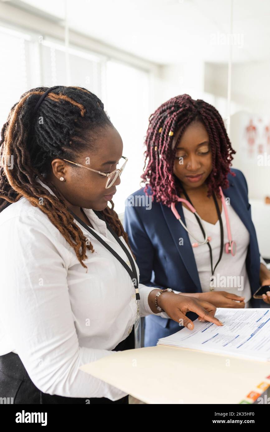 African doctors looking at chart hi-res stock photography and images ...