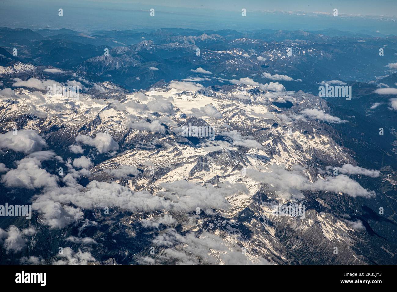 aerial view to the italien alps with soft clouds in the morning Stock ...