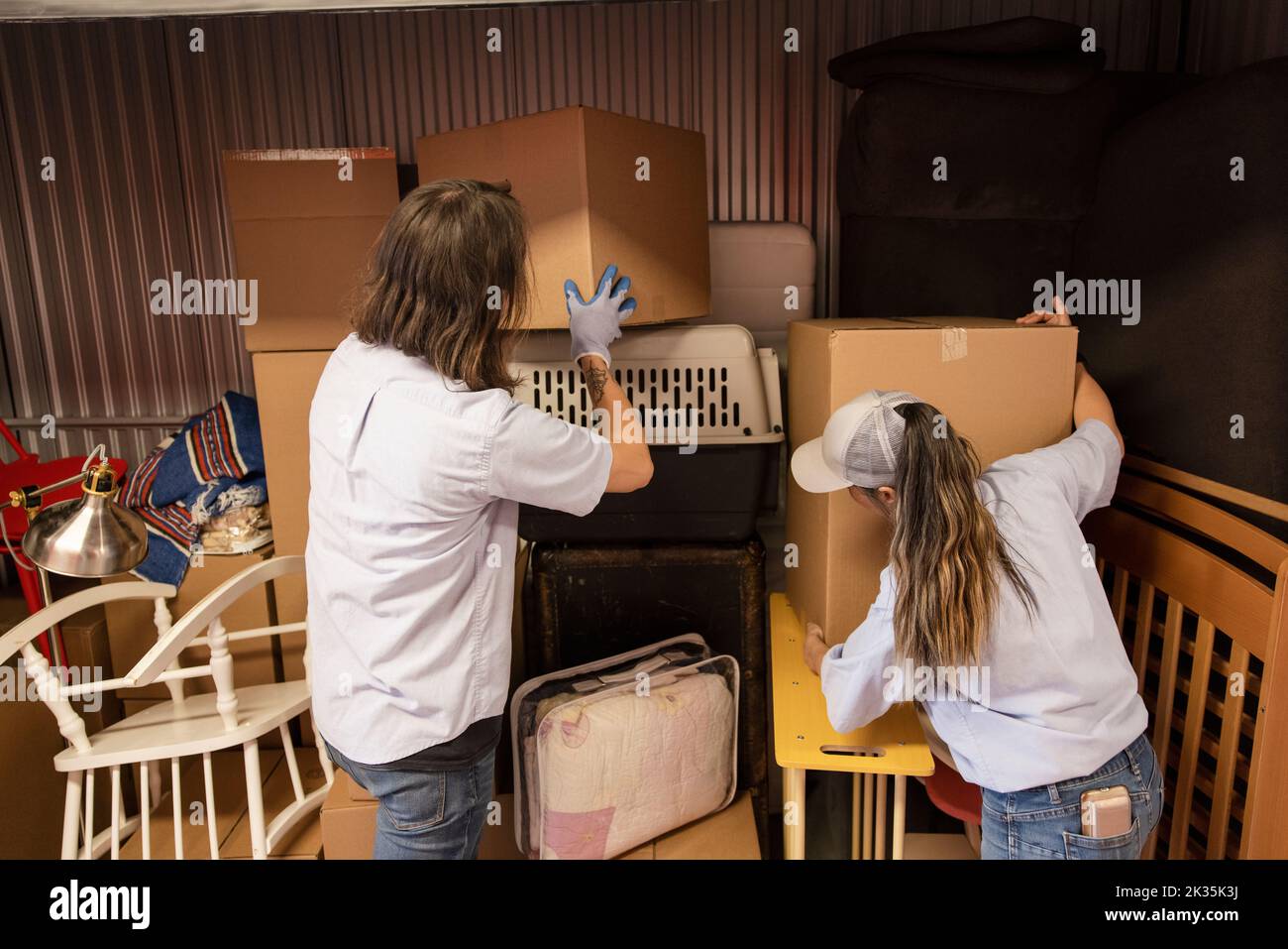 Stacking cardboard boxes hi-res stock photography and images - Alamy