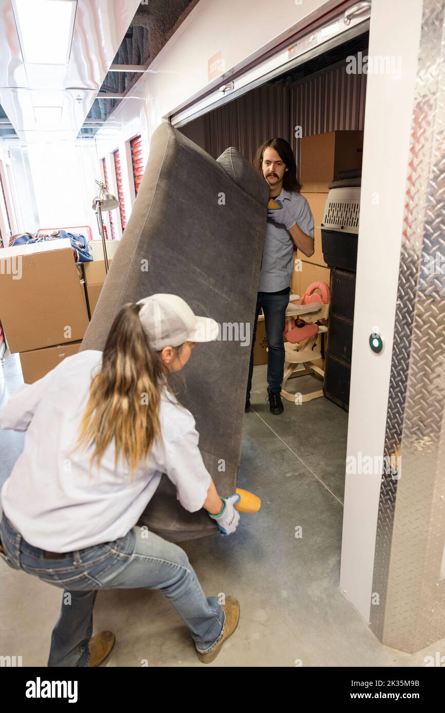 Movers moving sofa hi-res stock photography and images - Alamy