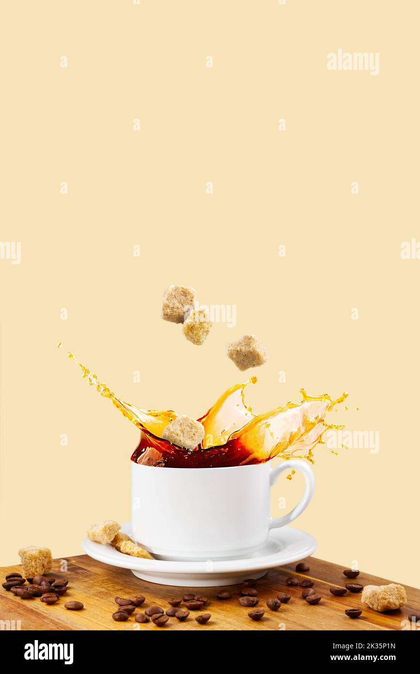 Falling coffee cup. Cup of coffee splashes while falling. Splash in ...