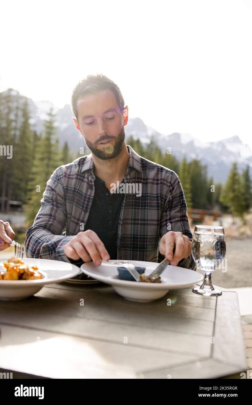 Man eating meal hi-res stock photography and images - Alamy