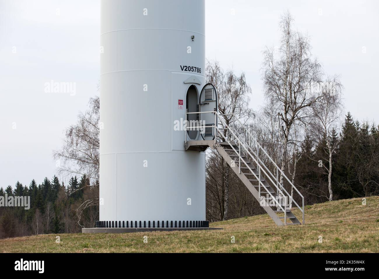Wind farm and open entrance door to the wind turbine seen in Zlata ...