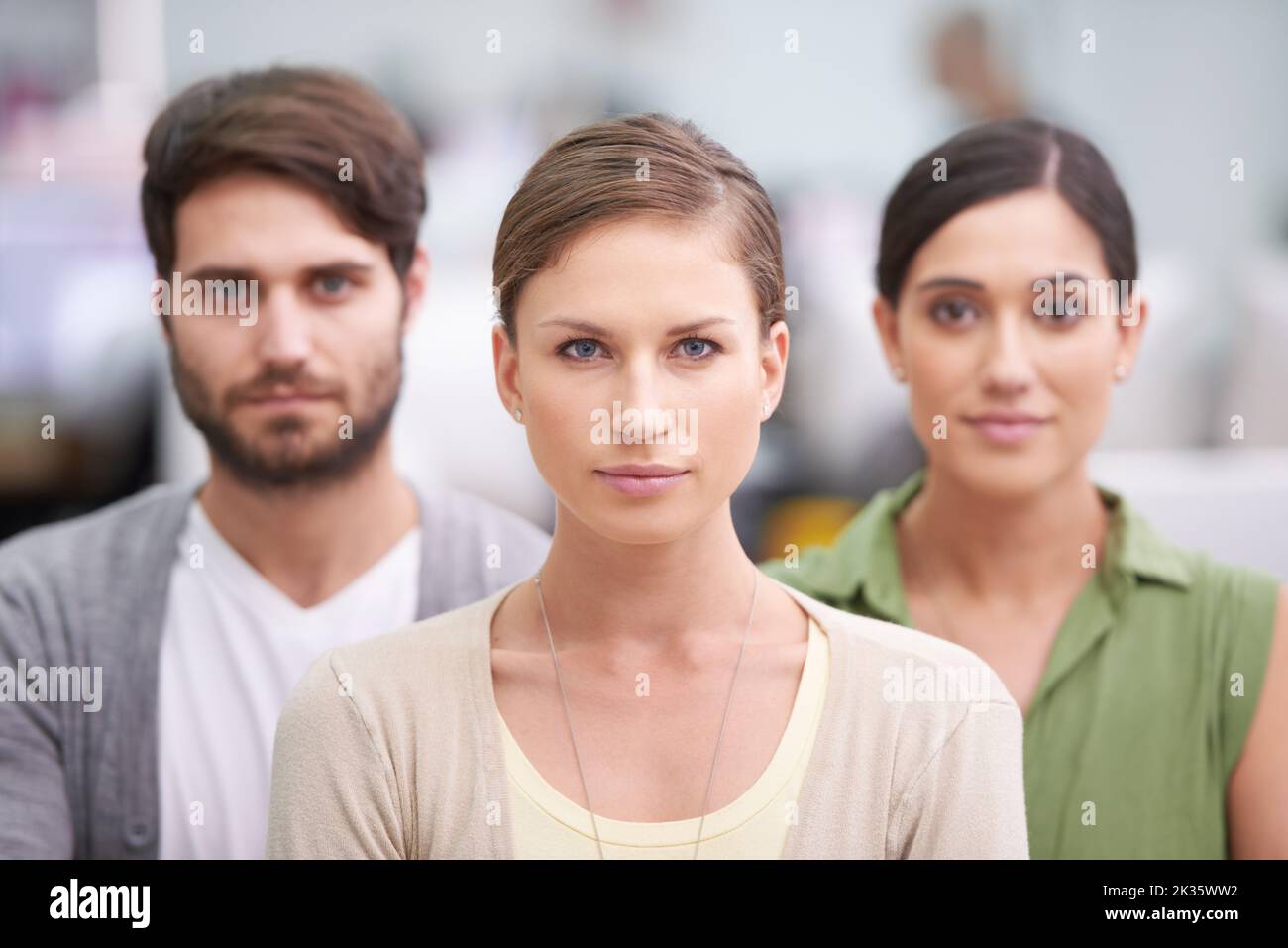 Were focused on our future. three work colleagues in the office Stock ...