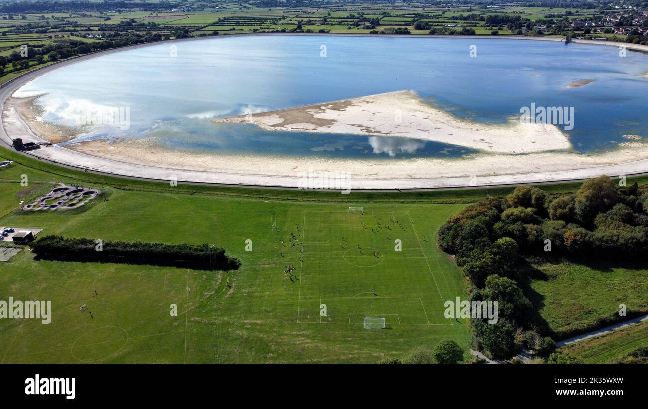 Aerial view of Cheddar playing fields, with Cheddar Reservoir, Somerset ...