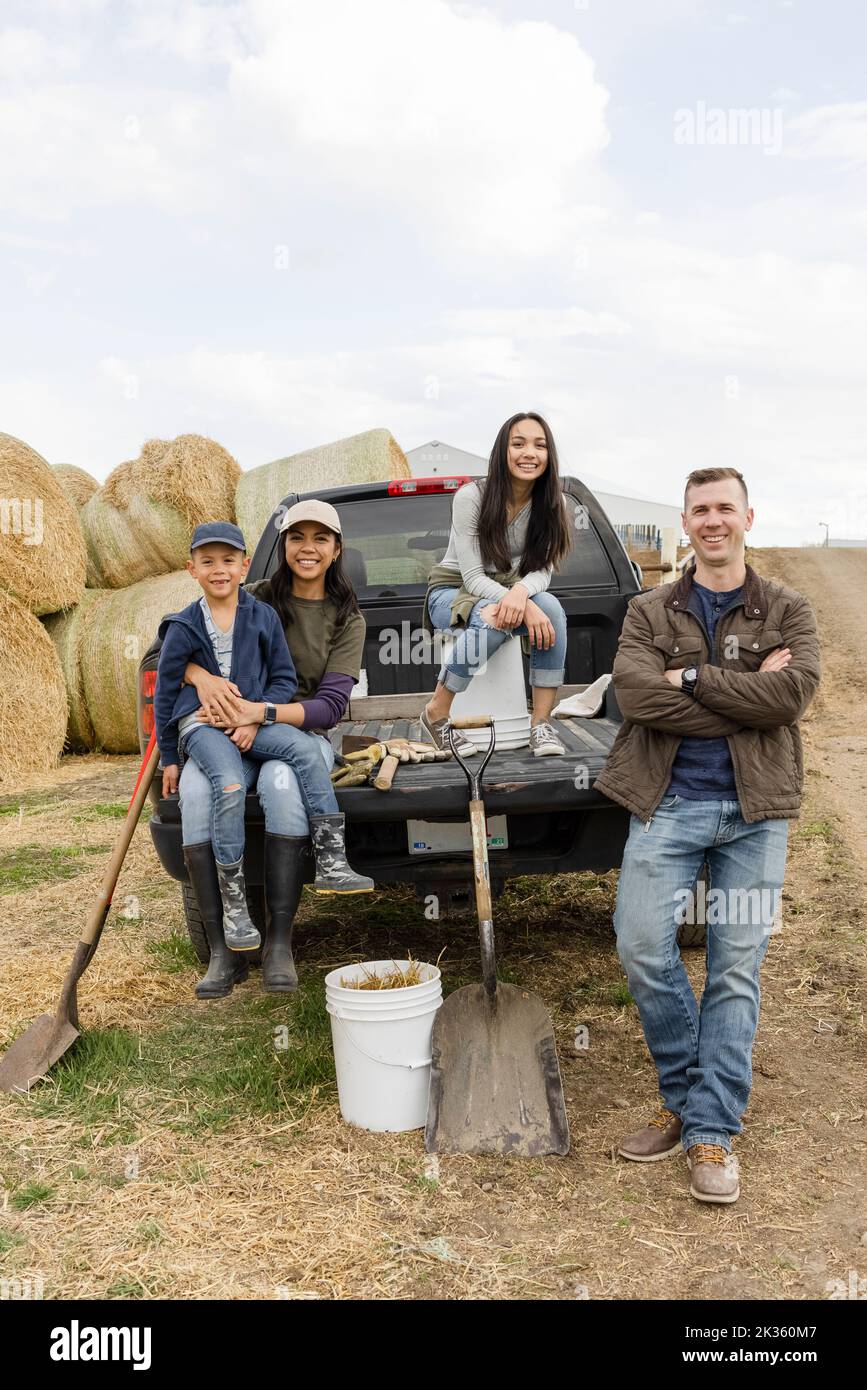 Man sitting on truck tailgate hi-res stock photography and images - Alamy