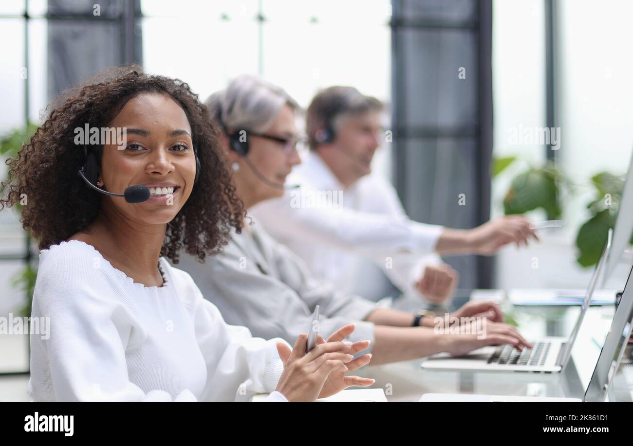 african american operator smiling in a call center Stock Photo - Alamy
