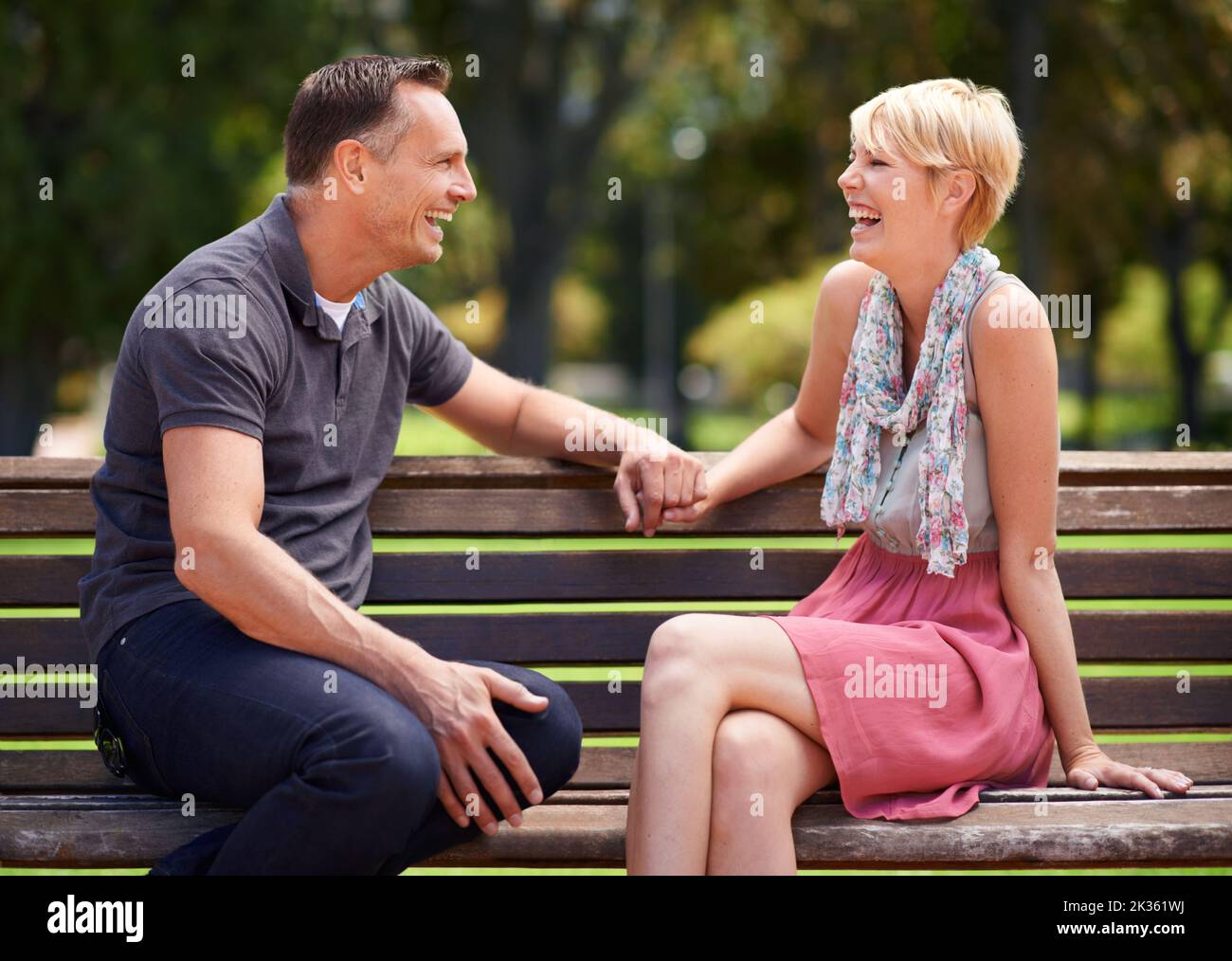 Enjoying some light banter in the park. a mature couple enjoying a ...