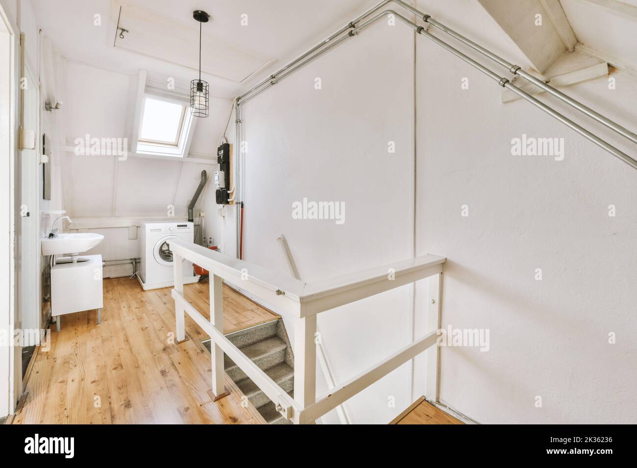 Interior of narrow corridor with telephone and radiator hanging on wall ...
