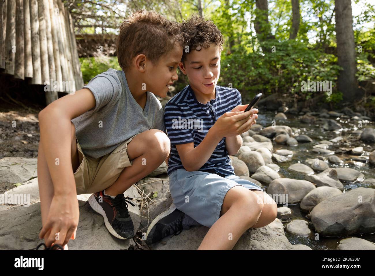 Child playing with rocks hi-res stock photography and images - Alamy