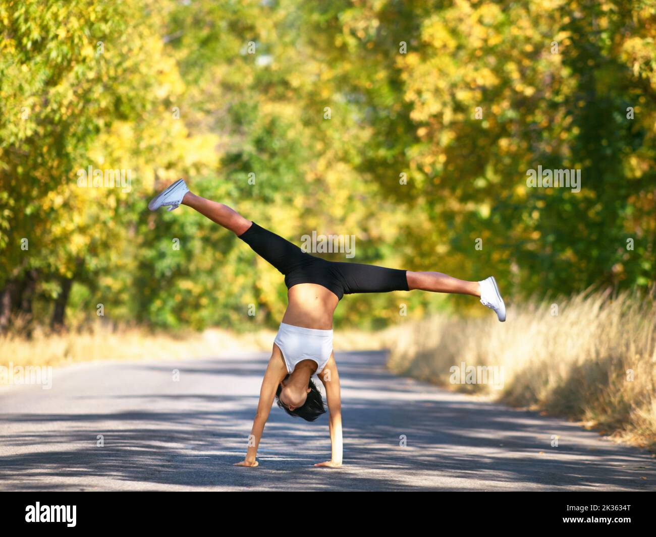 Cartwheel gymnastics hi-res stock photography and images - Alamy