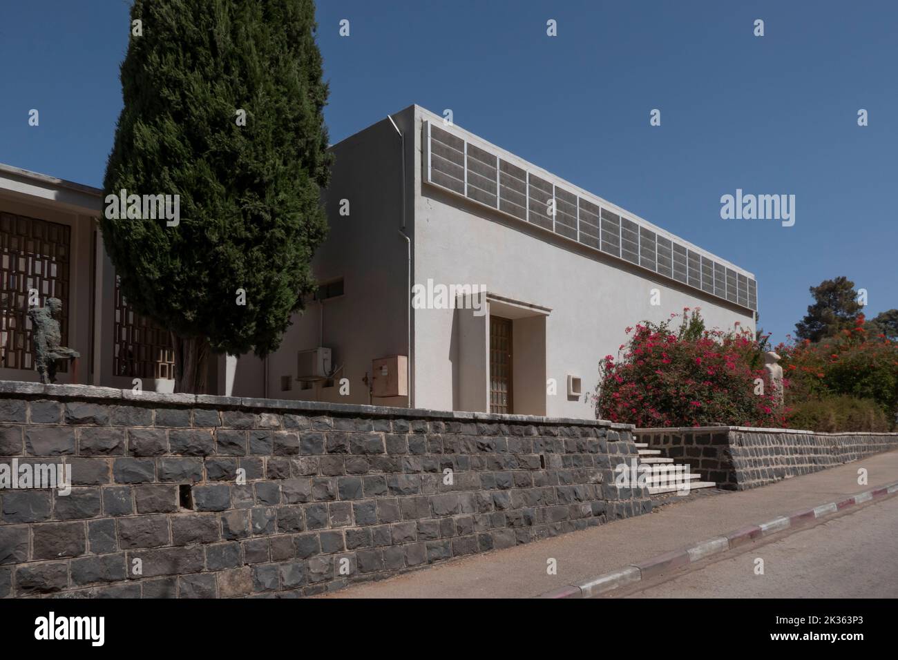 Visitors enter Mishkan Museum of Art located on the grounds of Kibbutz ...