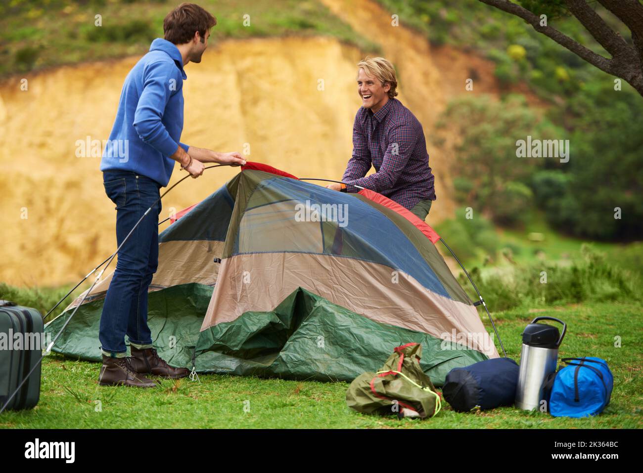 Camping is great fun. a two male friends at the campsite Stock Photo ...