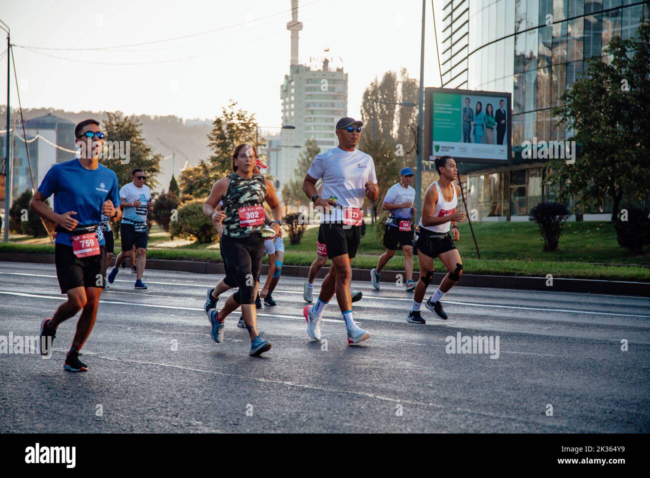 Kazakhstan, Almaty-September 25, 2022: Almaty marathon. People run down ...