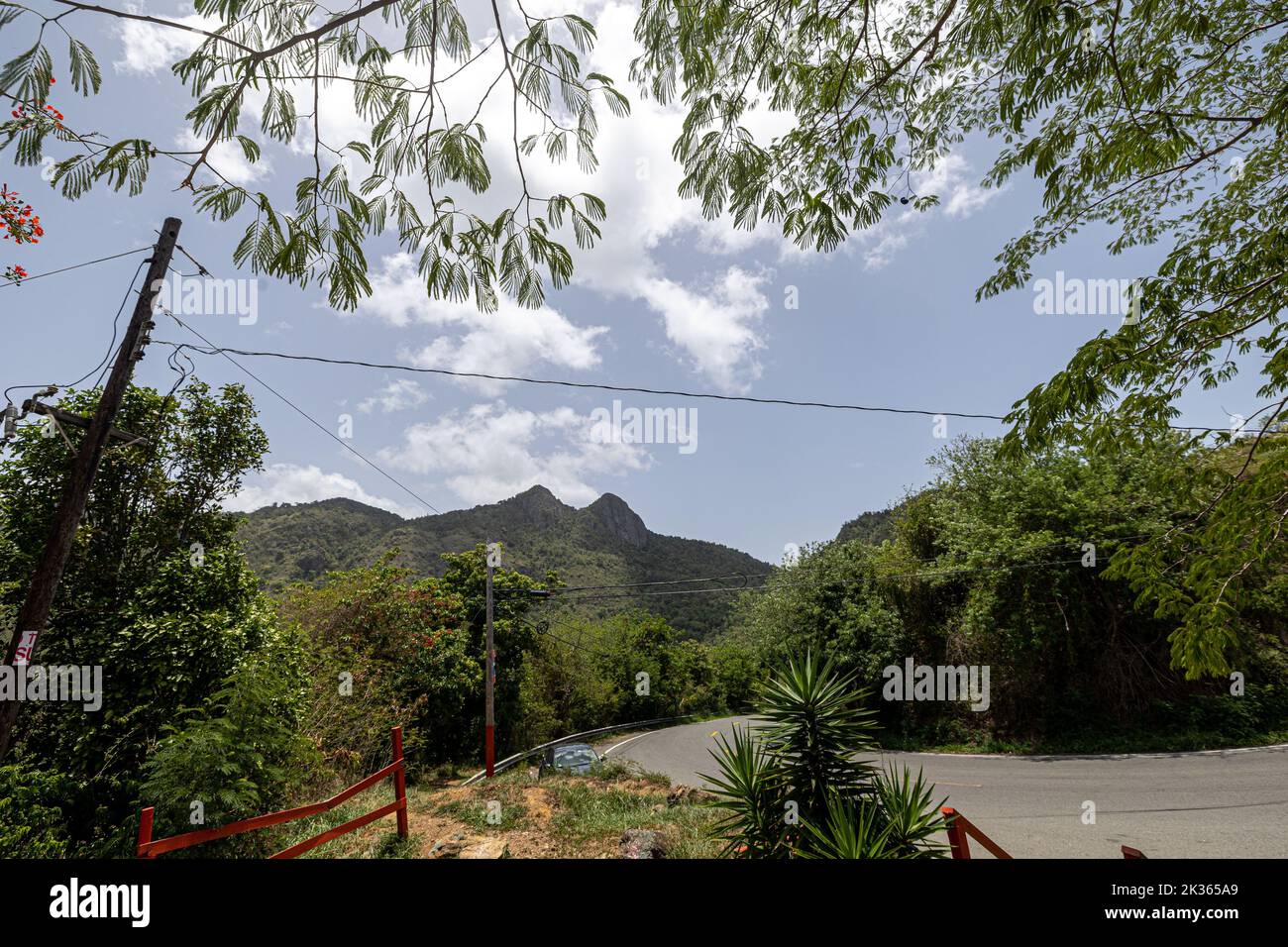 A mountain asphalt road leading to Cerro Las Tetas in Salinas, Puerto ...