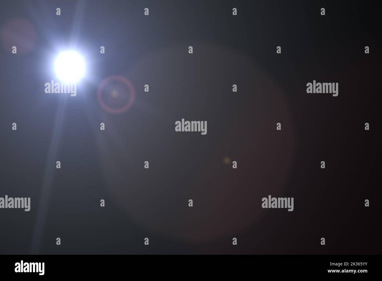 star flare in black background. Realistic lens flare in black ...