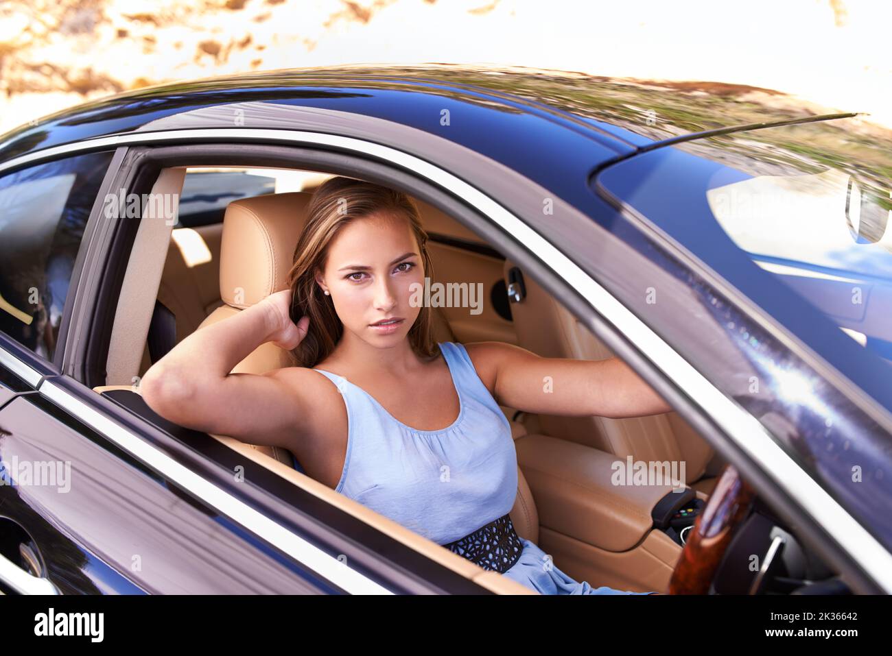 Im At Home Behind The Wheel A Woman Sitting In A Luxury Car Stock