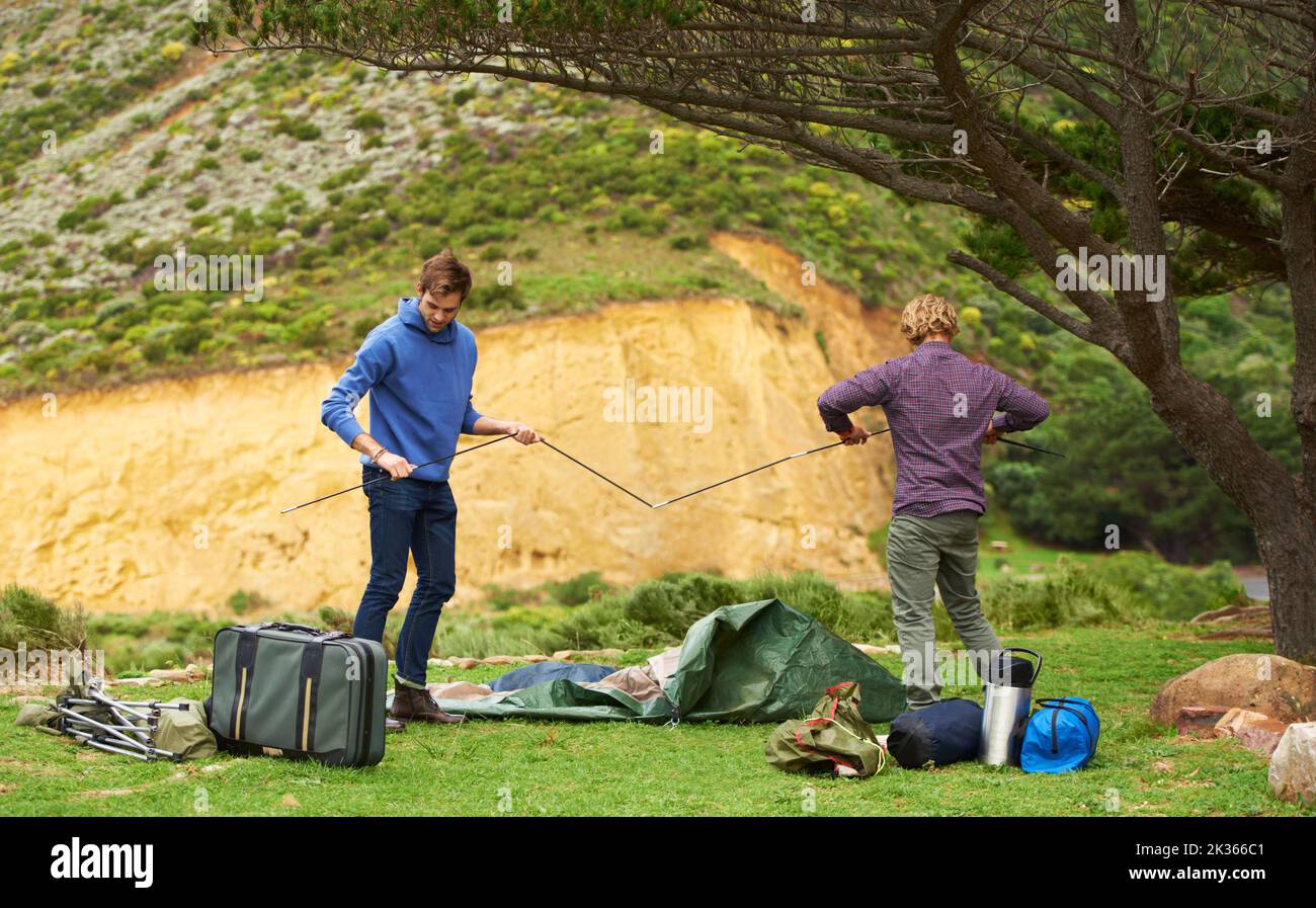 Camping is great fun. a two male friends at the campsite Stock Photo ...
