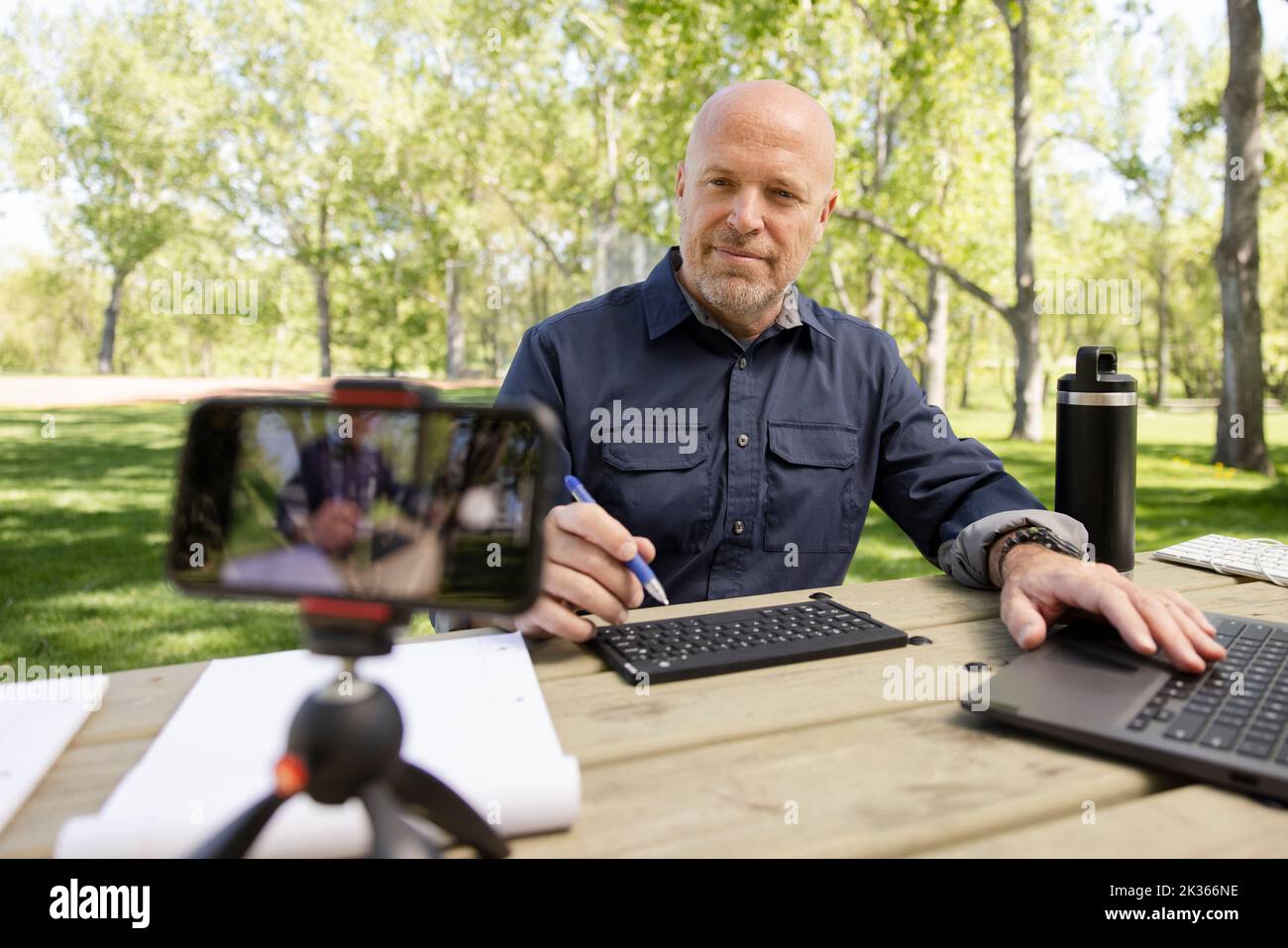 Man conducting virtual class hi-res stock photography and images - Alamy