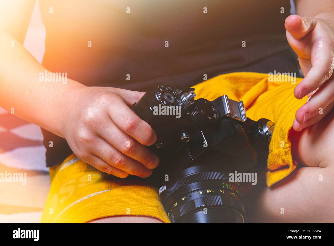 Baby and vintage camera. Beginner photographer. Photography courses ...
