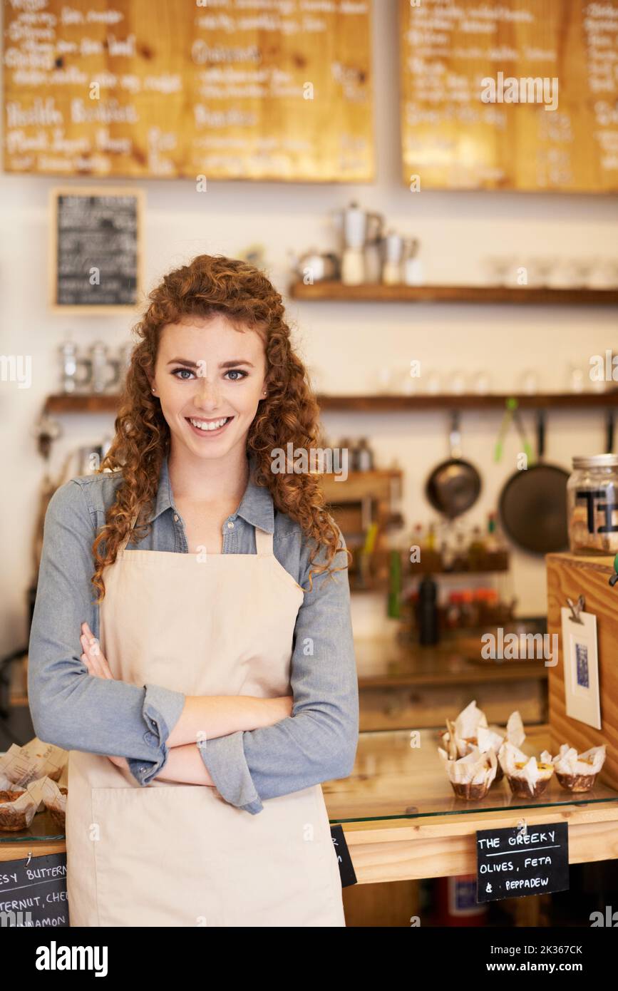 Beautiful barista ready to take your order. Closeup portrait of an ...