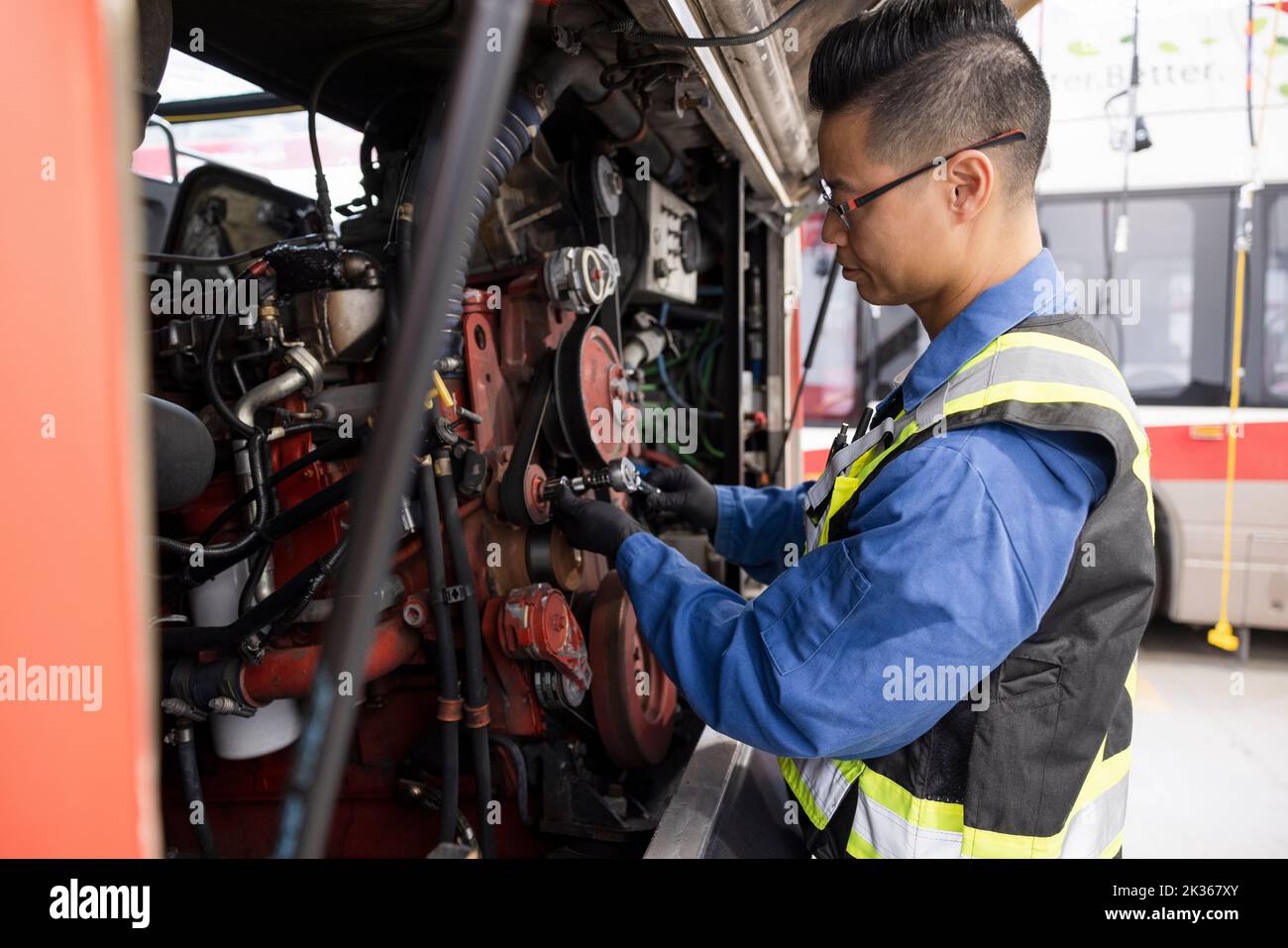 Mechanic fixing bus hi-res stock photography and images - Alamy