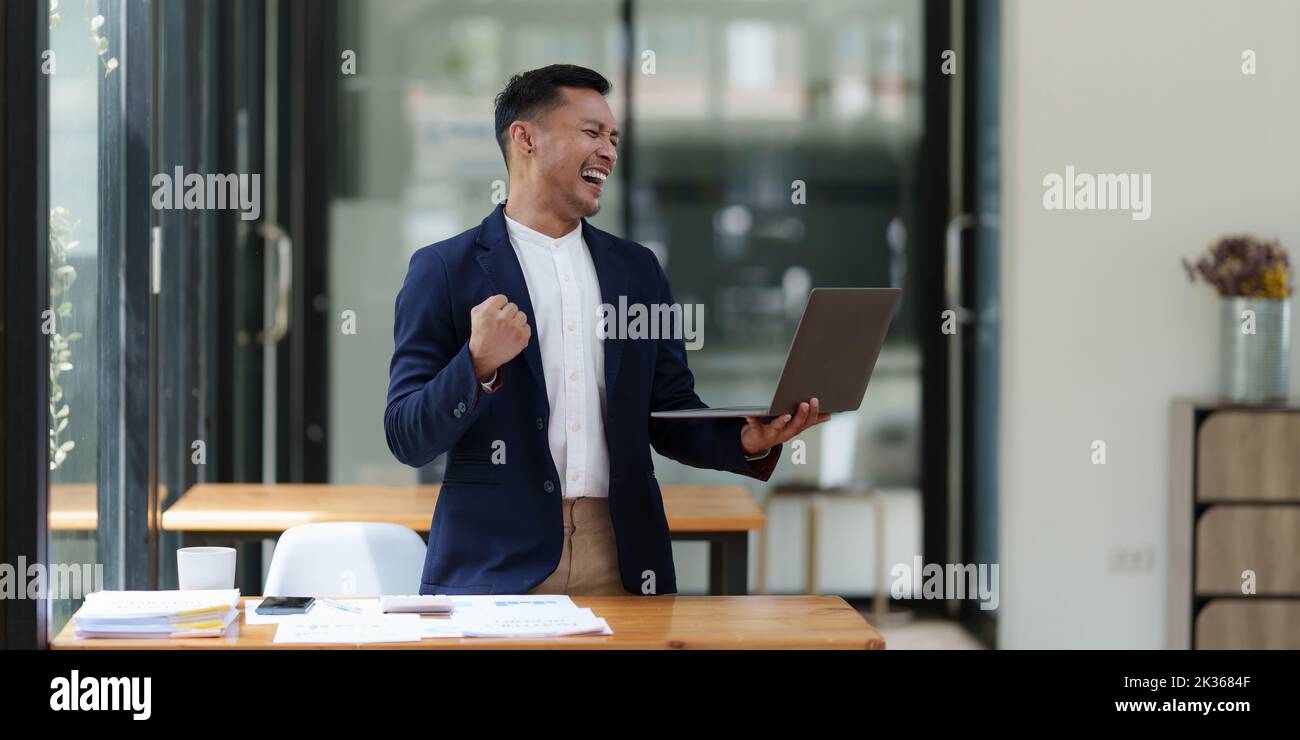 A successful entrepreneur analyzing a technical price graph and ...