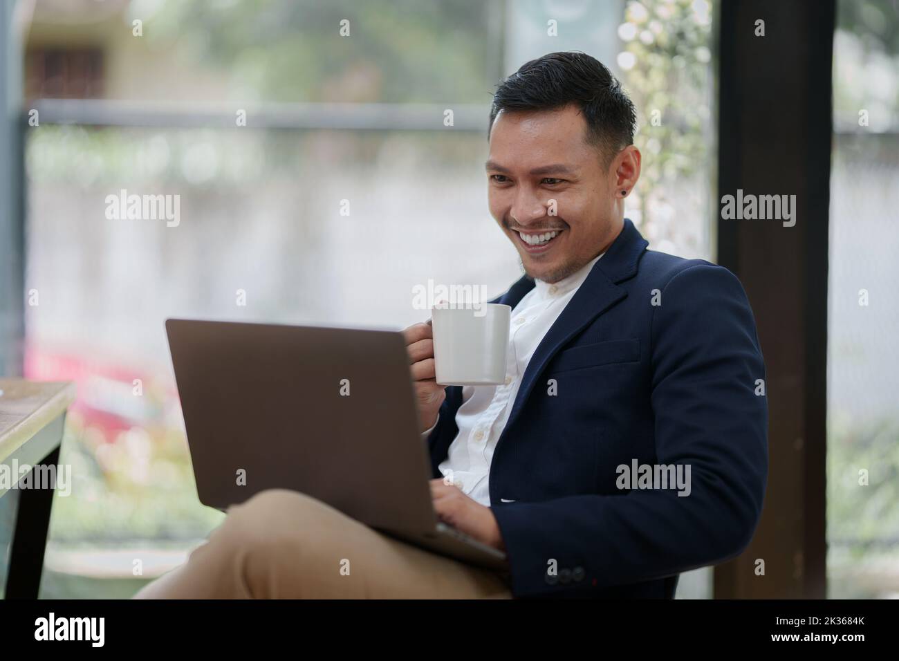A successful entrepreneur analyzing a technical price graph and ...