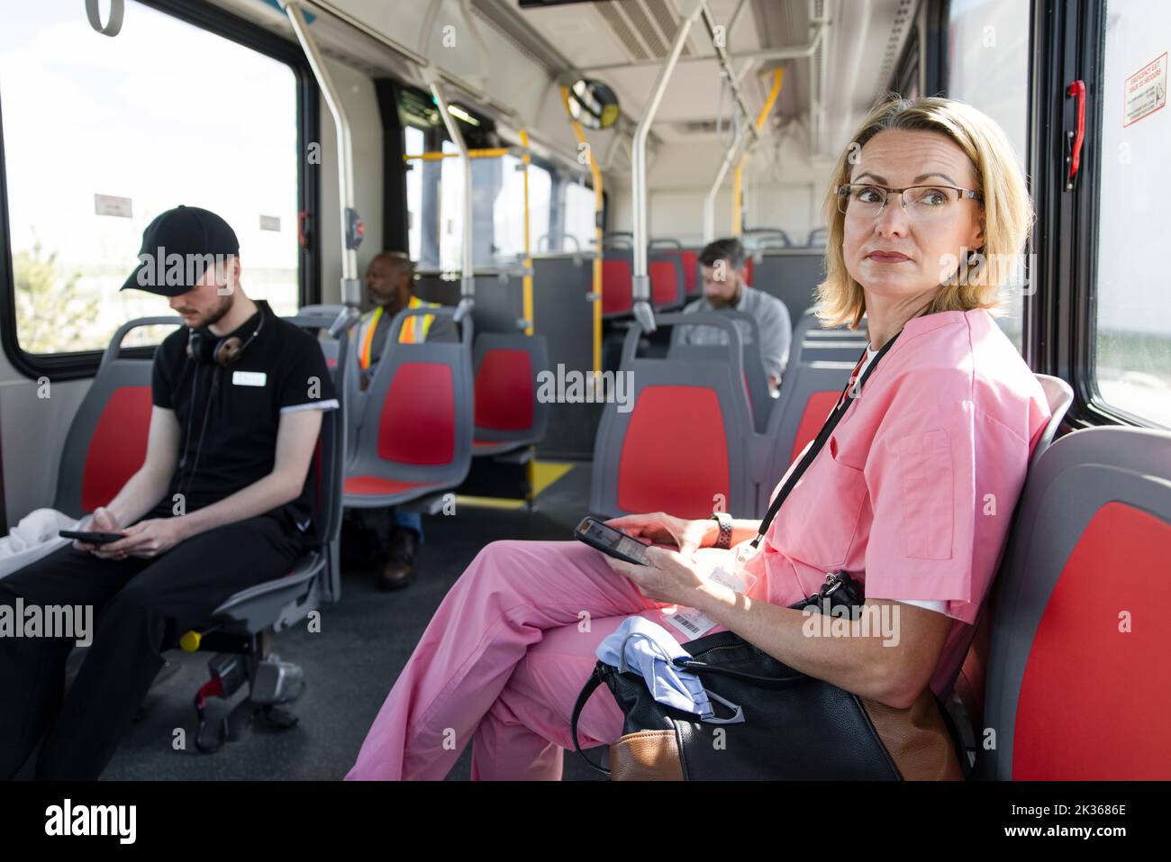 Nurse in pink hi-res stock photography and images - Alamy