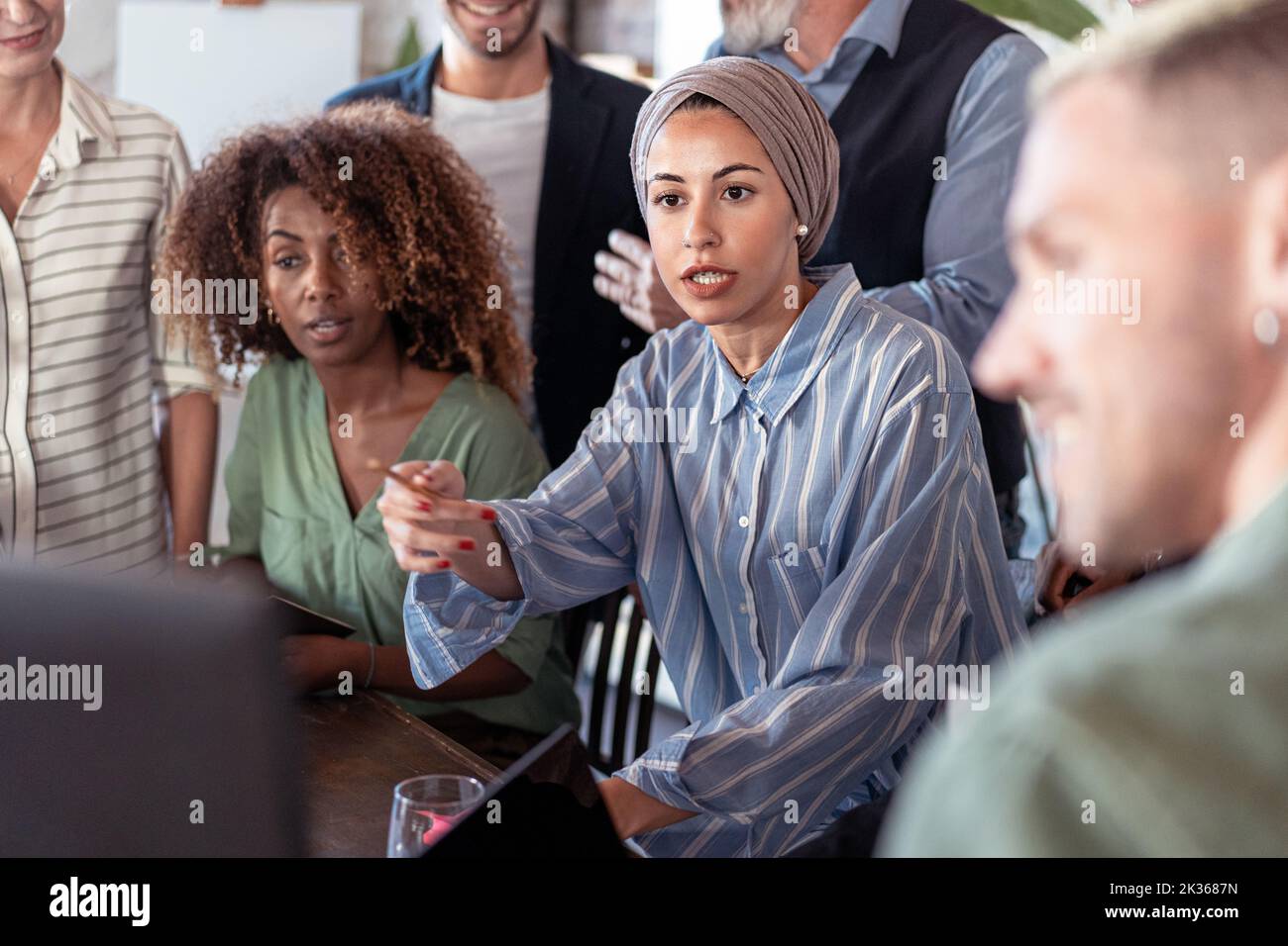 Solution solving multiethnic hi-res stock photography and images - Alamy