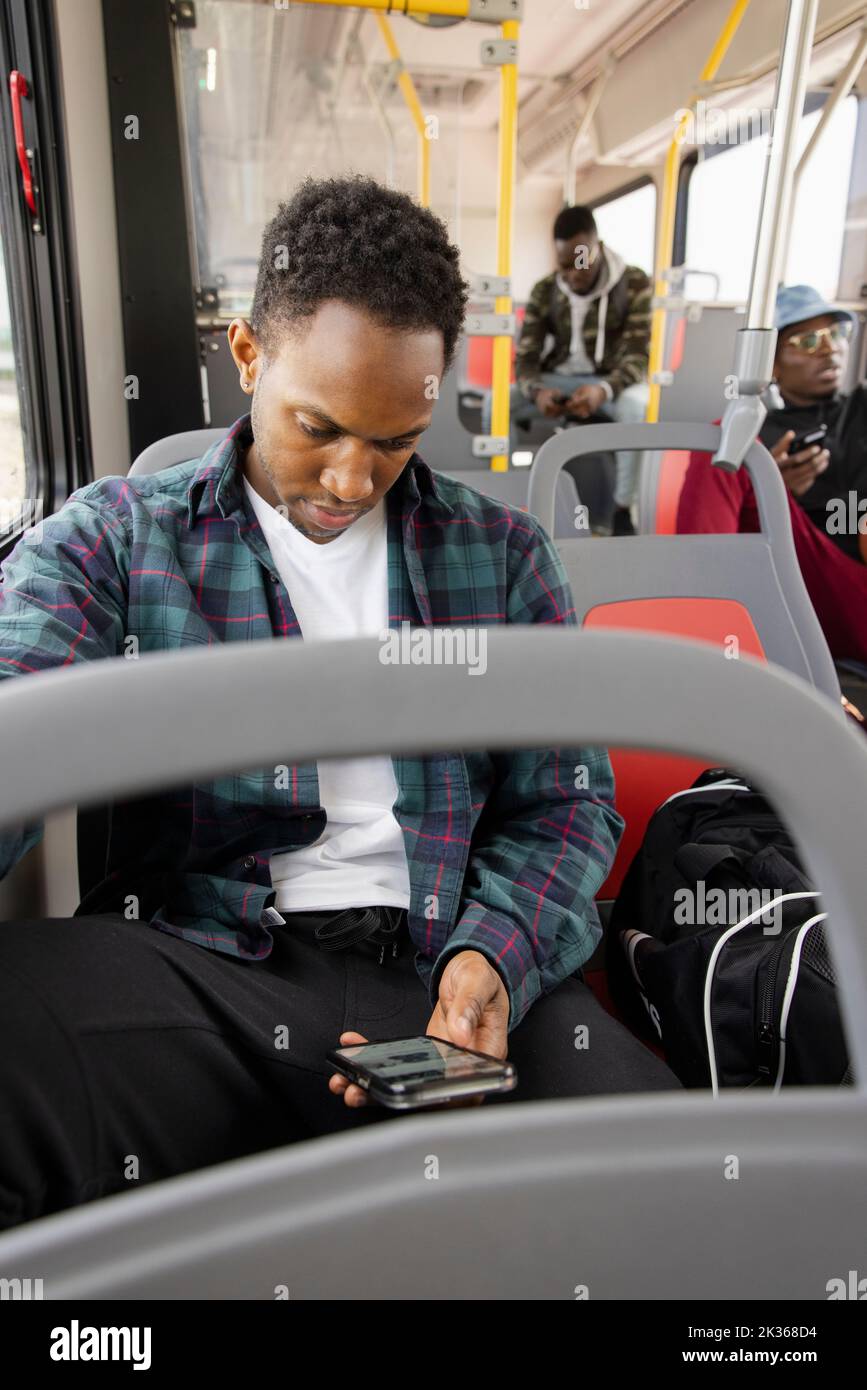 Black man using a transit hi-res stock photography and images - Alamy