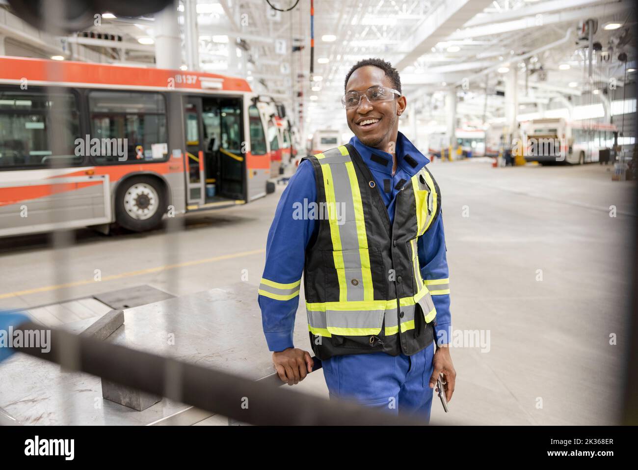 Man bus smiling hi-res stock photography and images - Alamy